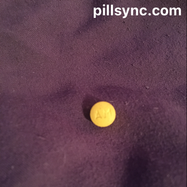 round yellow AM 25 - Australia Entrip amitriptyline Pill Images